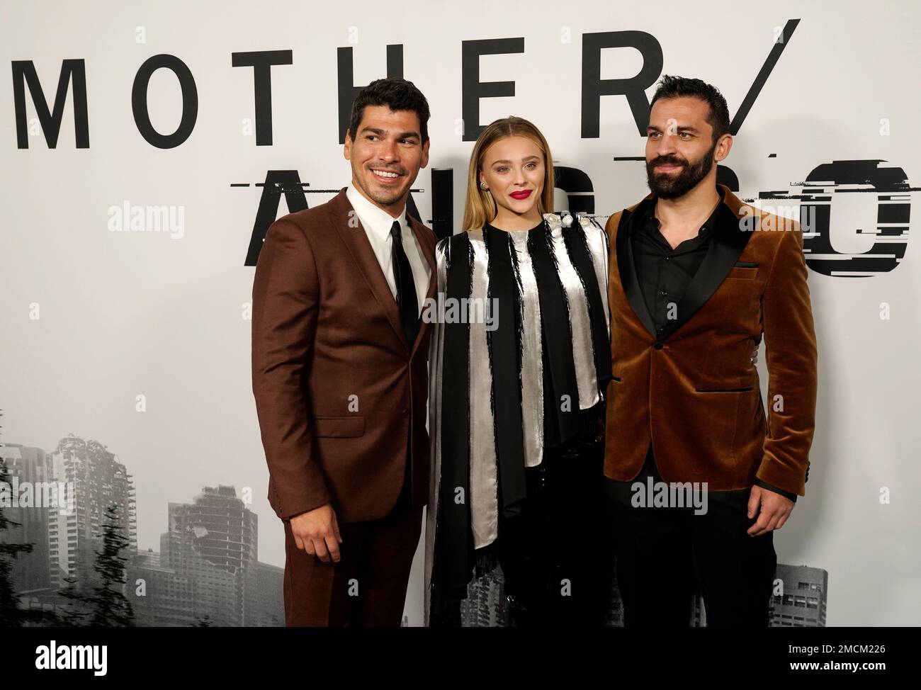 Mattson Tomlin, right, writer/director of "Mother/Android," poses with ...