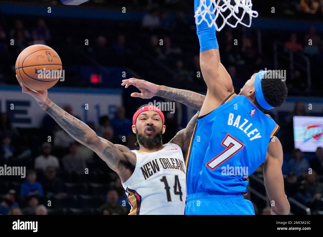 New Orleans Pelicans forward Brandon Ingram (14) passes around Oklahoma ...