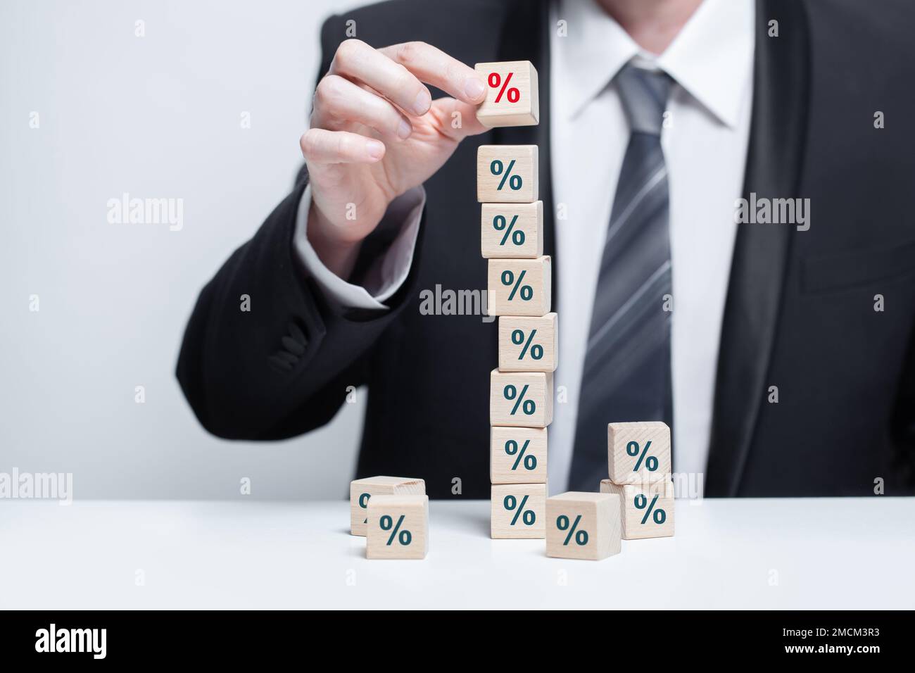 Wooden cubes with green percent signs, business percentage banks ...
