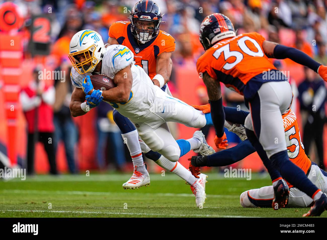 Los Angeles Chargers running back Austin Ekeler (30) runs for a ...