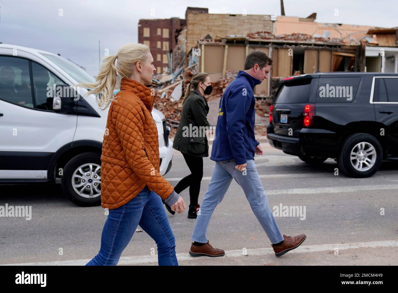 Kentucky Gov. Andy Beshear and his wife Britainy Beshear survey storm ...