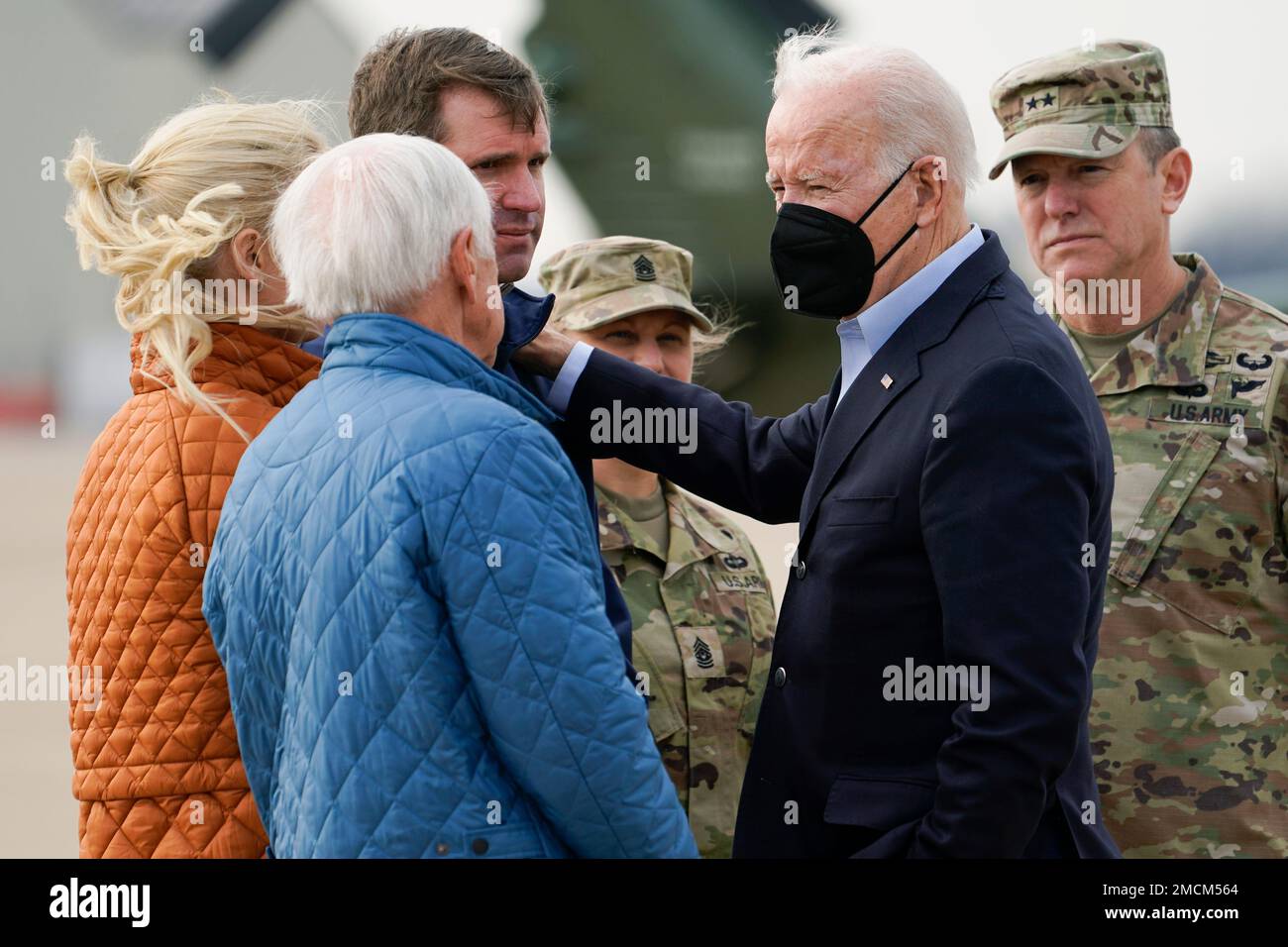 President Joe Biden greets Kentucky Gov. Andy Beshear and his wife ...