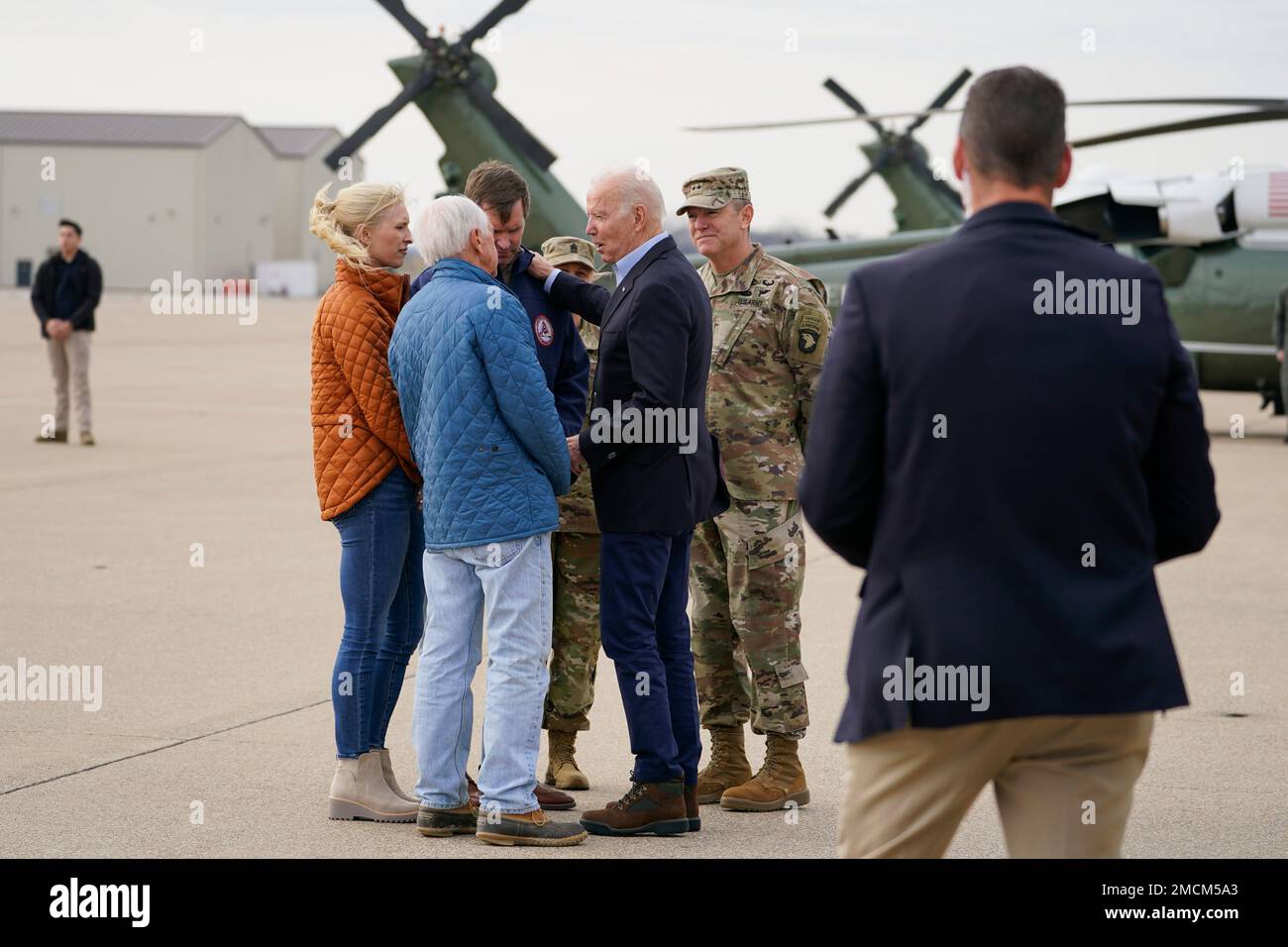 President Joe Biden greets Kentucky Gov. Andy Beshear, his wife ...