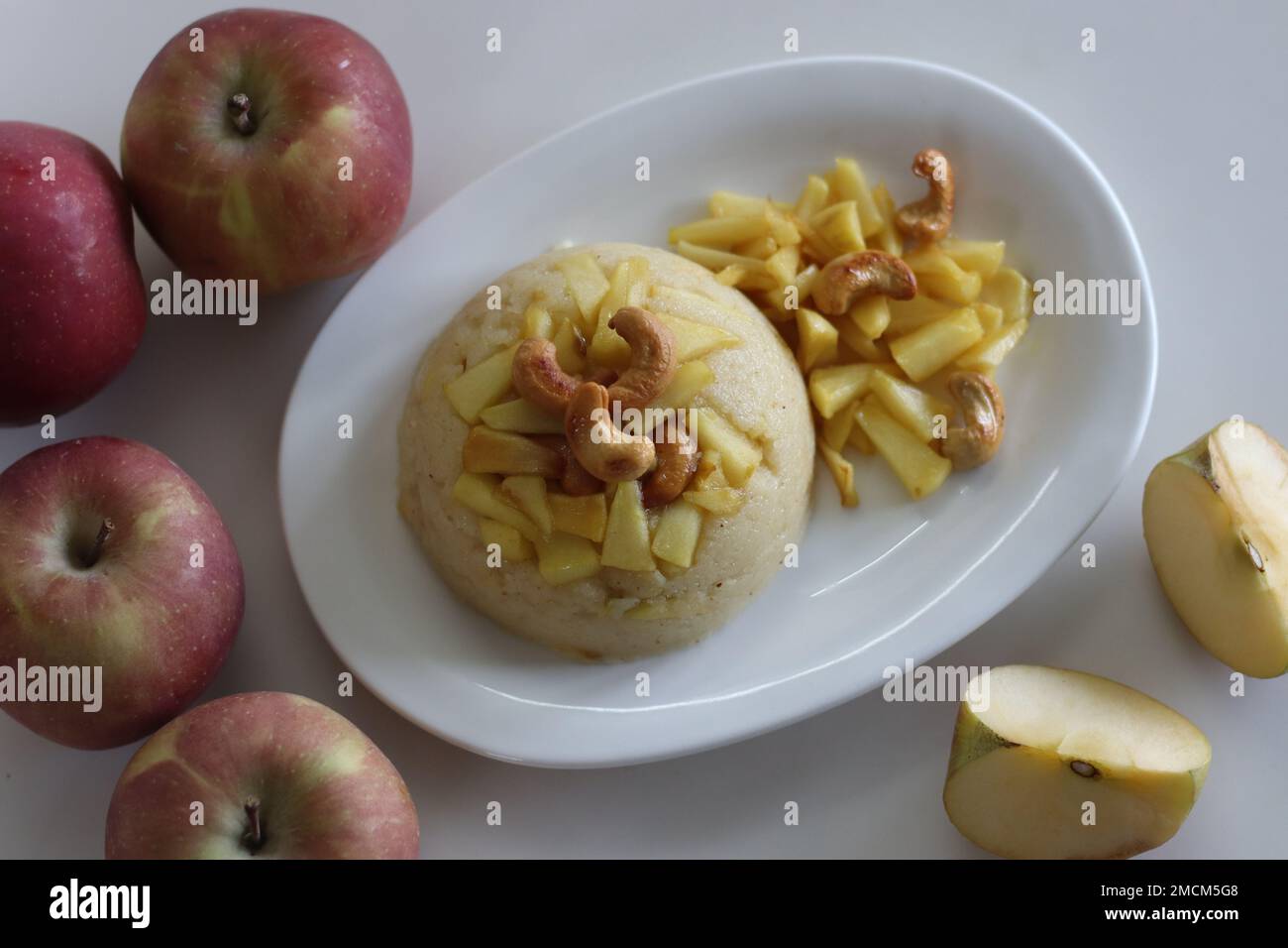 Apple Sheera. Indian pudding made of semolina flour, ghee, milk, dates ...