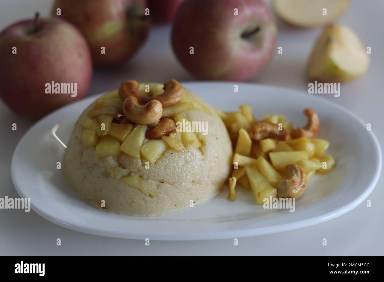 Apple Sheera. Indian pudding made of semolina flour, ghee, milk, dates ...