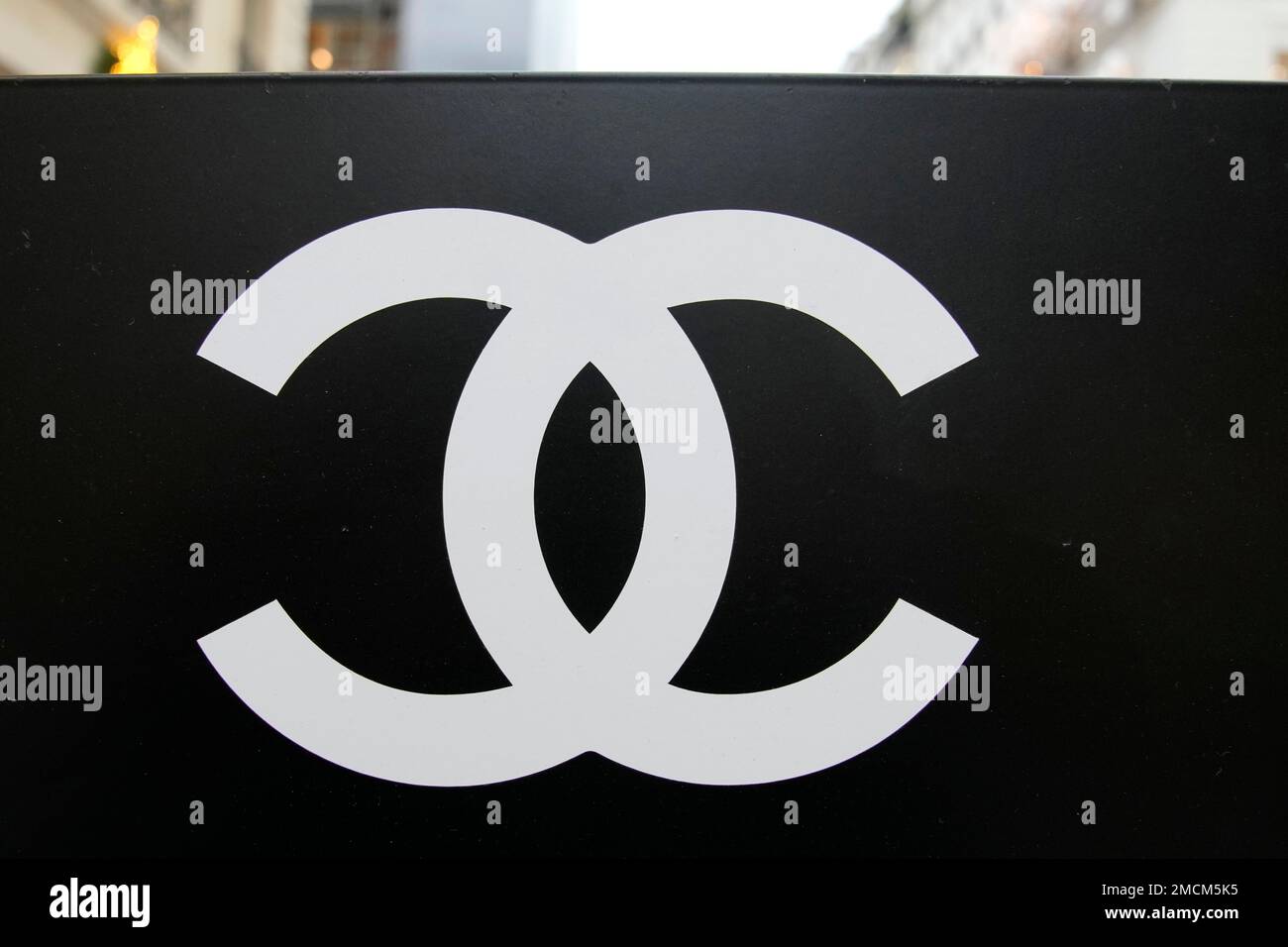Chanel logo is pictured on a valet sign outside a Chanel boutique ...