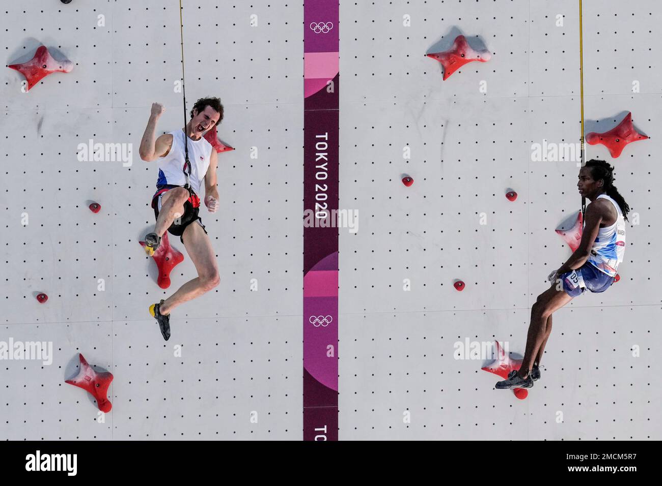 Czech Republic's Adam Ondra, left, celebrates during the speed portion ...