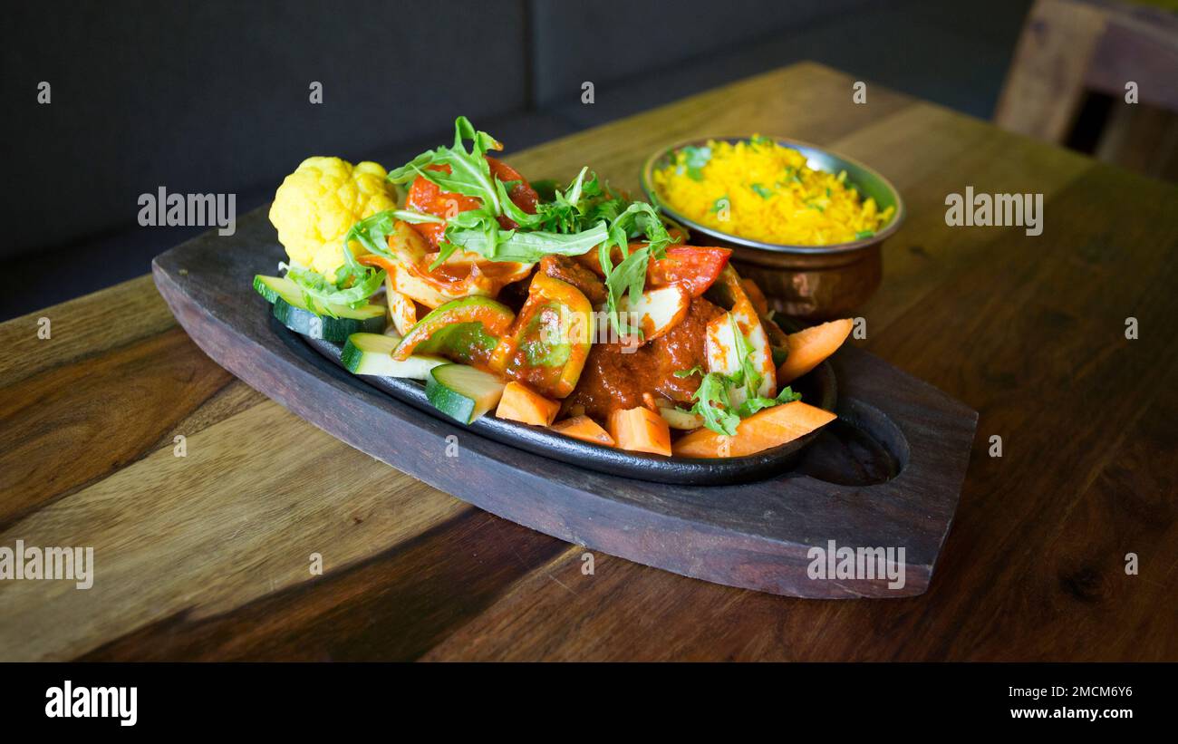 Roasted vegetables with curry rice. Traditional Indian Food Stock Photo ...
