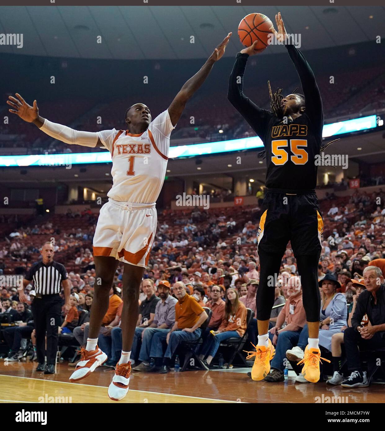 Arkansas-Pine Bluff guard Shawn Williams (55) shoots over Texas guard ...