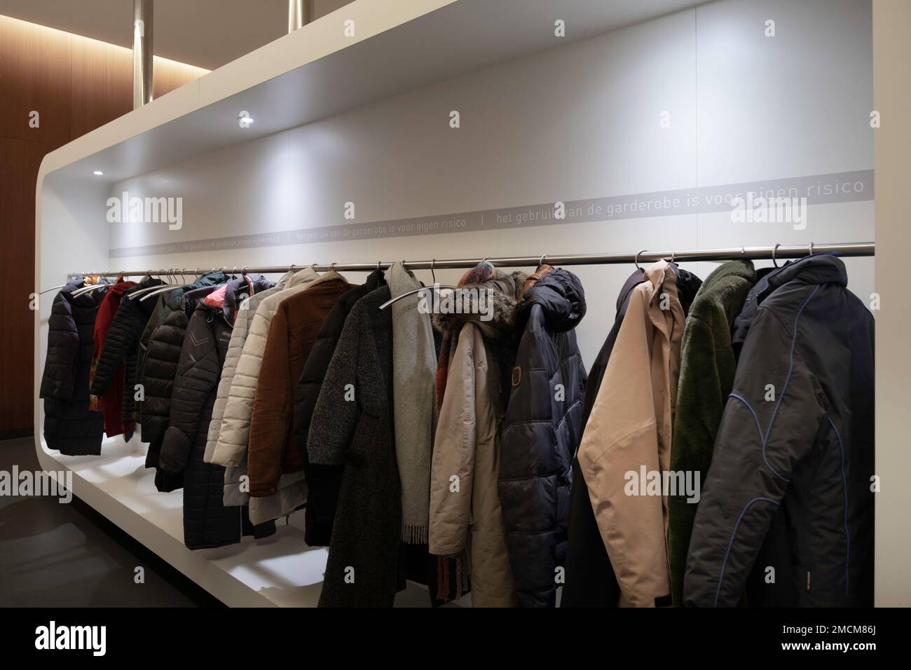 Modern museum cloak room hi-res stock photography and images - Alamy