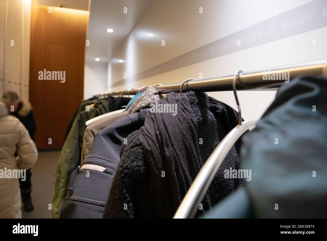 Modern museum cloak room hi-res stock photography and images - Alamy