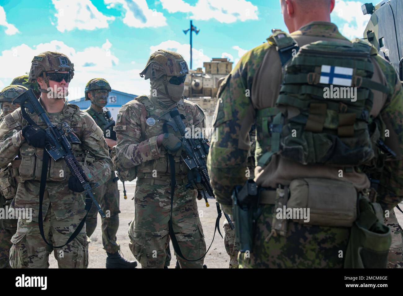 Finnish soldiers assigned to the Satakunta Jaeger Battalion, and U.S ...