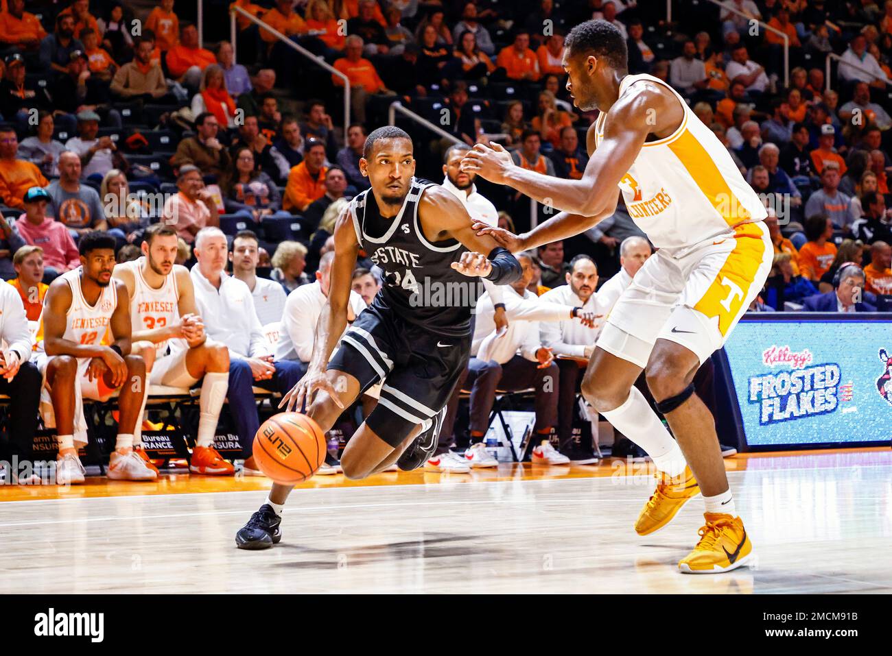 USC Upstate guard Nick Alves (24) drives against Tennessee forward ...