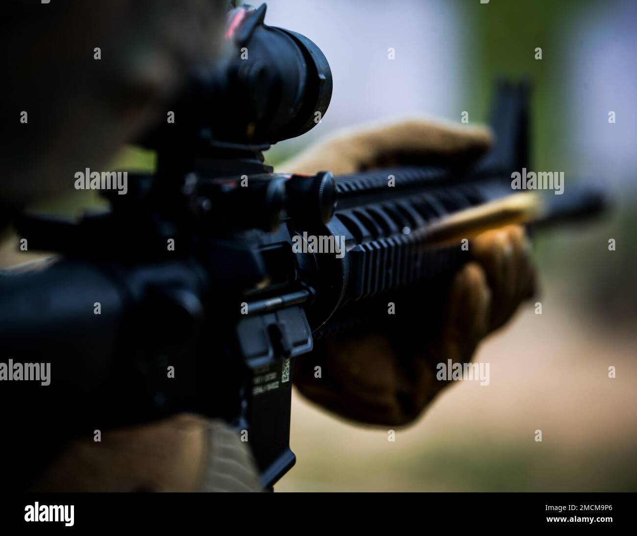 A Marine with Guard Company, Marine Barracks Washington, fires the ...