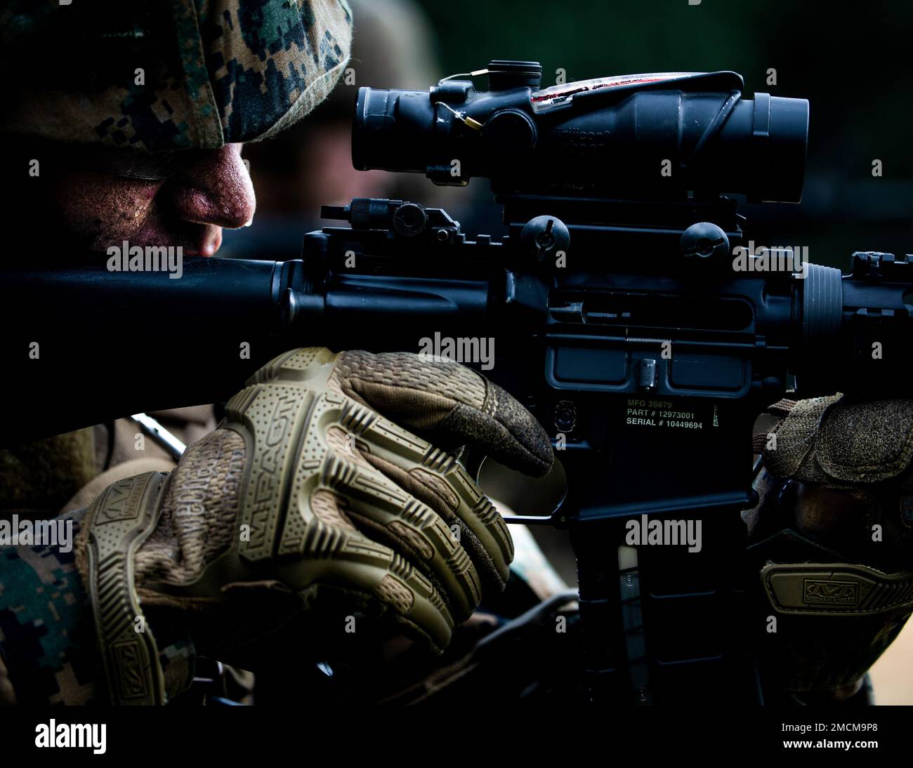 A Marine with Guard Company, Marine Barracks Washington, sights in on ...