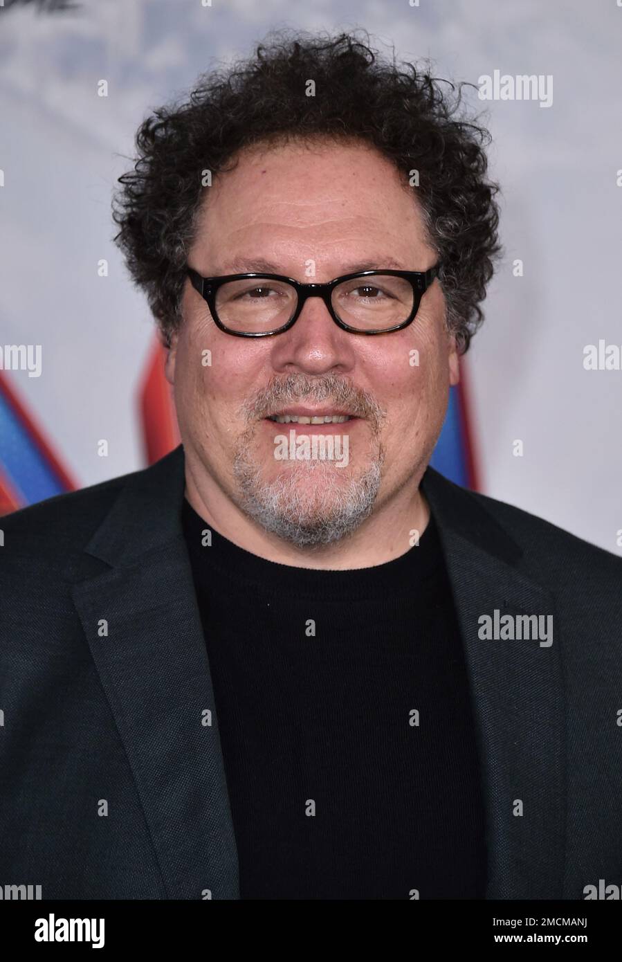 Jon Favreau arrives at the premiere of "Spider-Man: No Way Home" at the ...