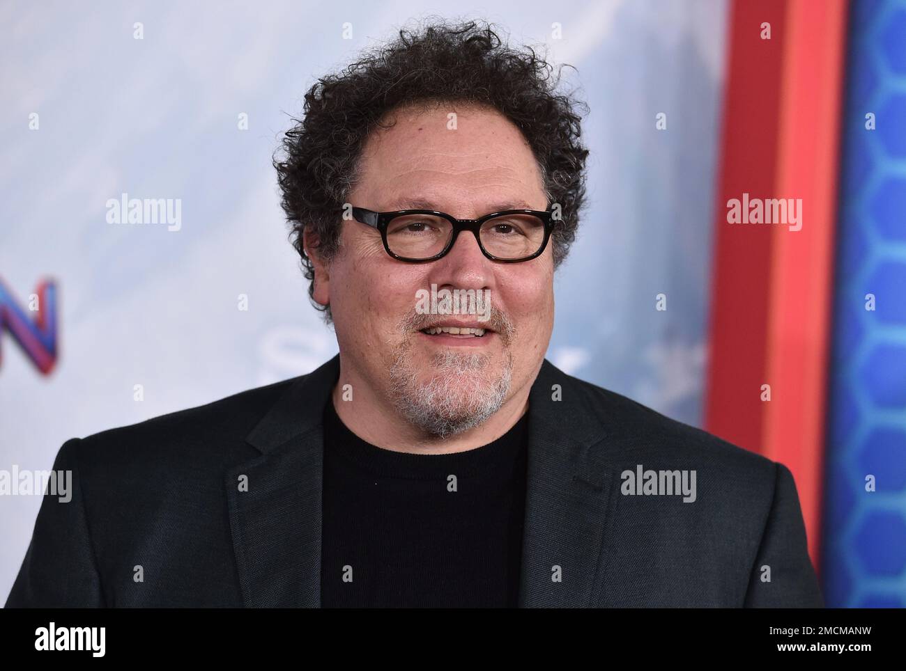Jon Favreau arrives at the premiere of "Spider-Man: No Way Home" at the ...