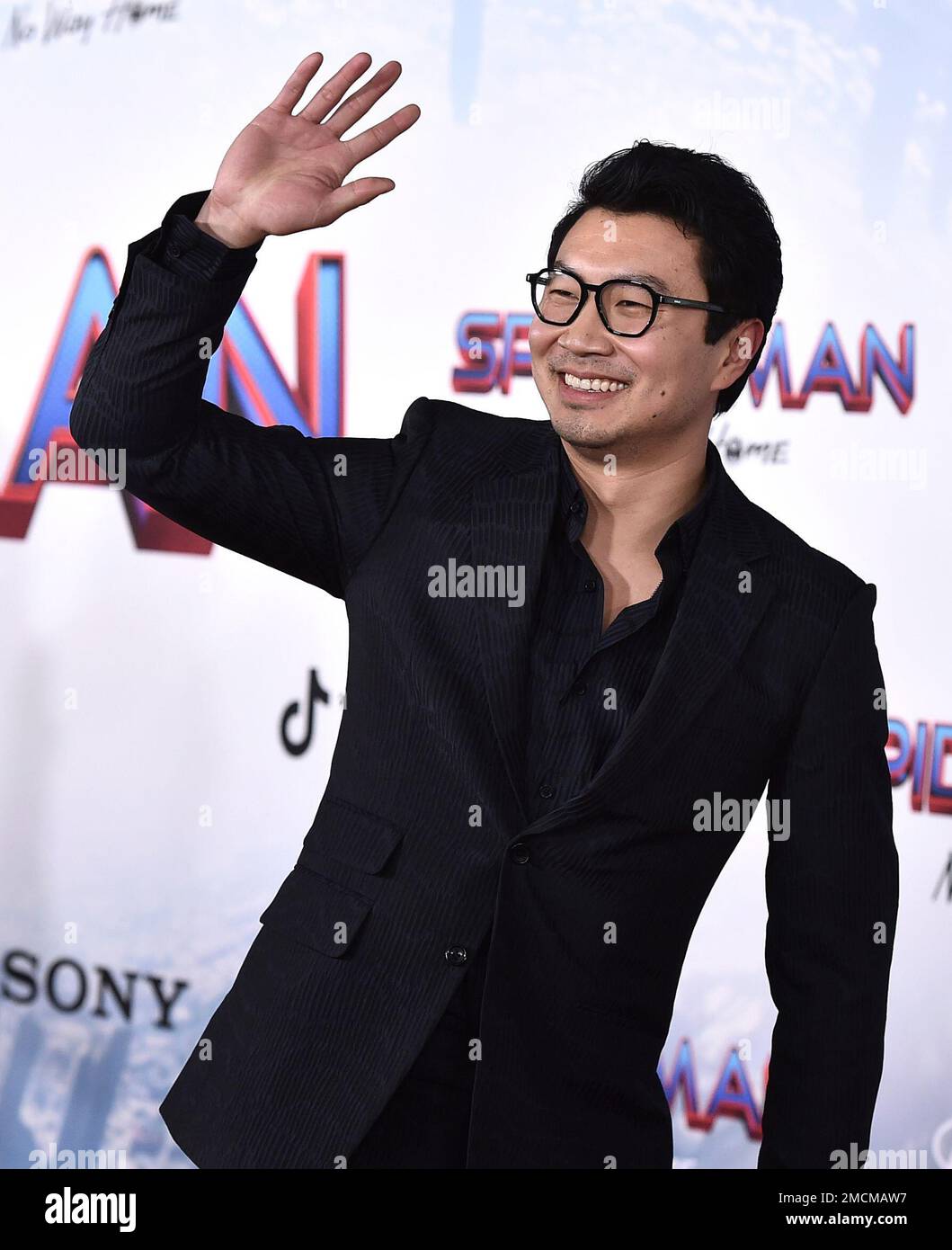 Simu Liu arrives at the premiere of "Spider-Man: No Way Home" at the ...