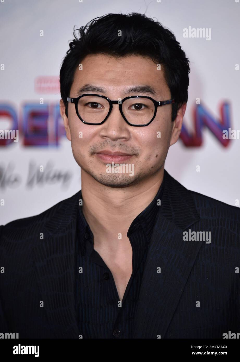 Simu Liu arrives at the premiere of "Spider-Man: No Way Home" at the ...