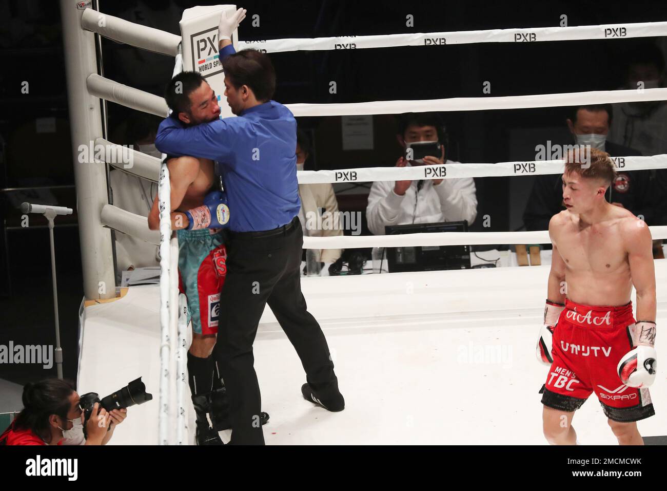 The referee stops Aran Diapen of Thailand as he fights Boxing IBF and ...