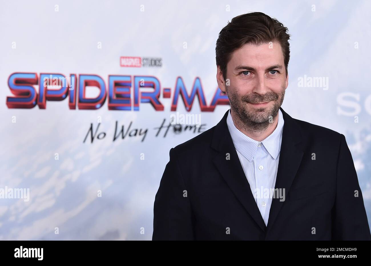 Director Jon Watts arrives at the premiere of "Spider-Man: No Way Home ...
