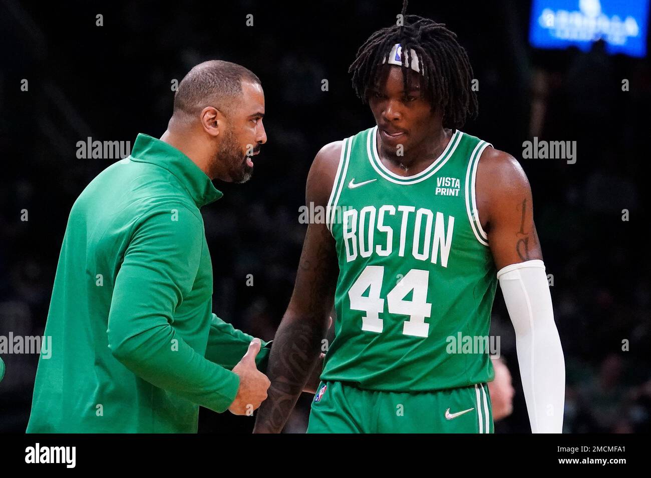 Boston Celtics head coach Ime Udoka, left, talks with center Robert ...
