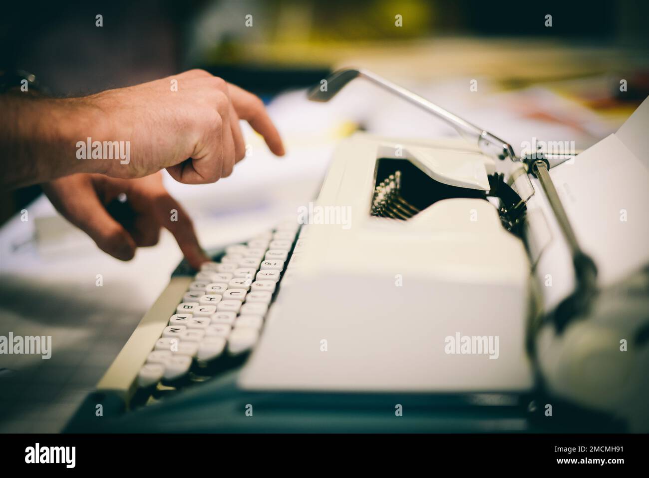 Typing on analog typewriter with fingertips Stock Photo - Alamy