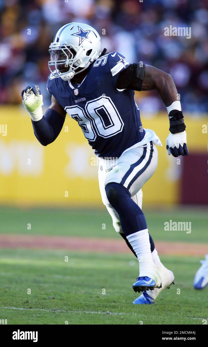 Dallas Cowboys defensive end Demarcus Lawrence (90) runs during an NFL ...