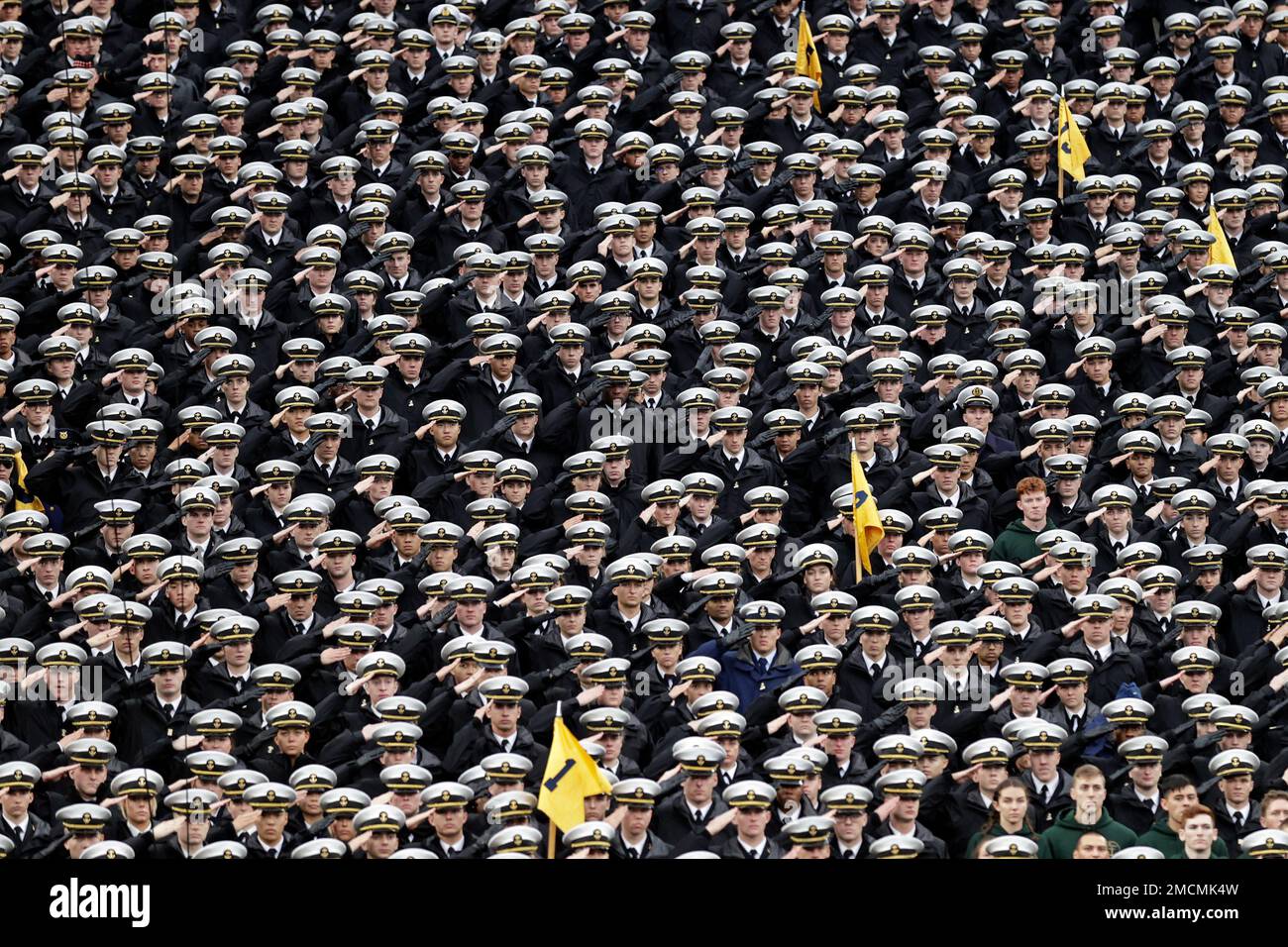Navy midshipman salute before the first half of an NCAA college ...