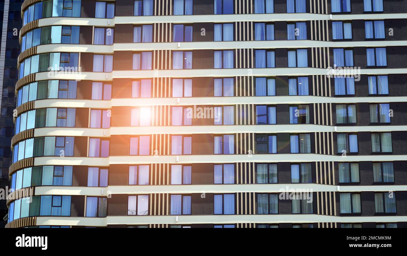 Exterior of a high modern multi-story apartment building - facade ...