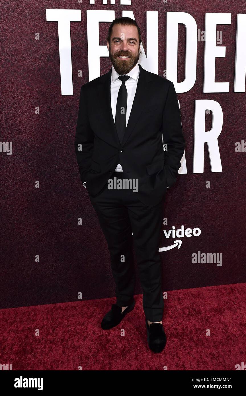 Matthew Delamater arrives at the premiere of "The Tender Bar" on Sunday ...
