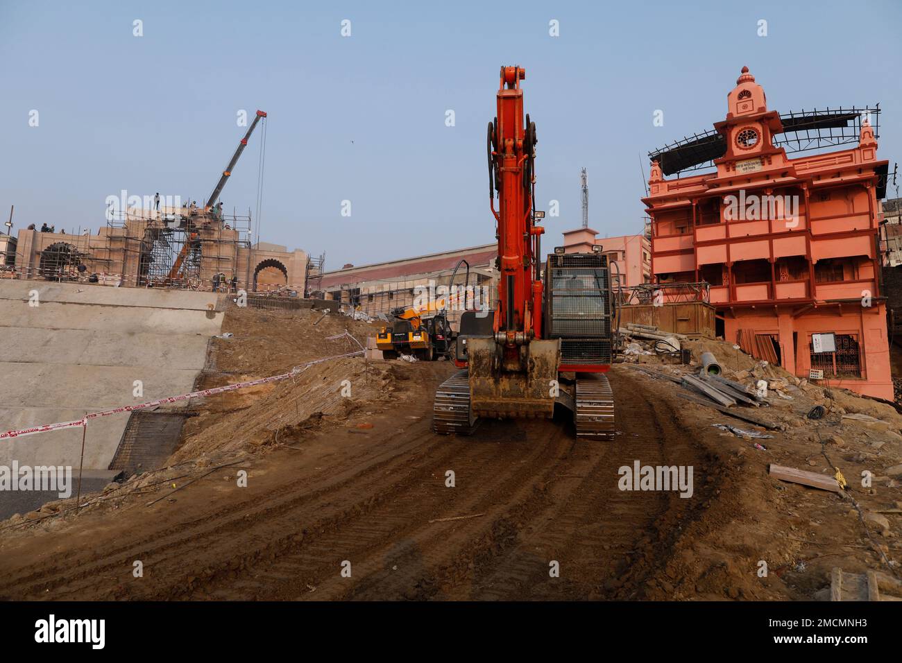 Laborers work at the under-construction Kashi Vishwanath Dham Corridor ...