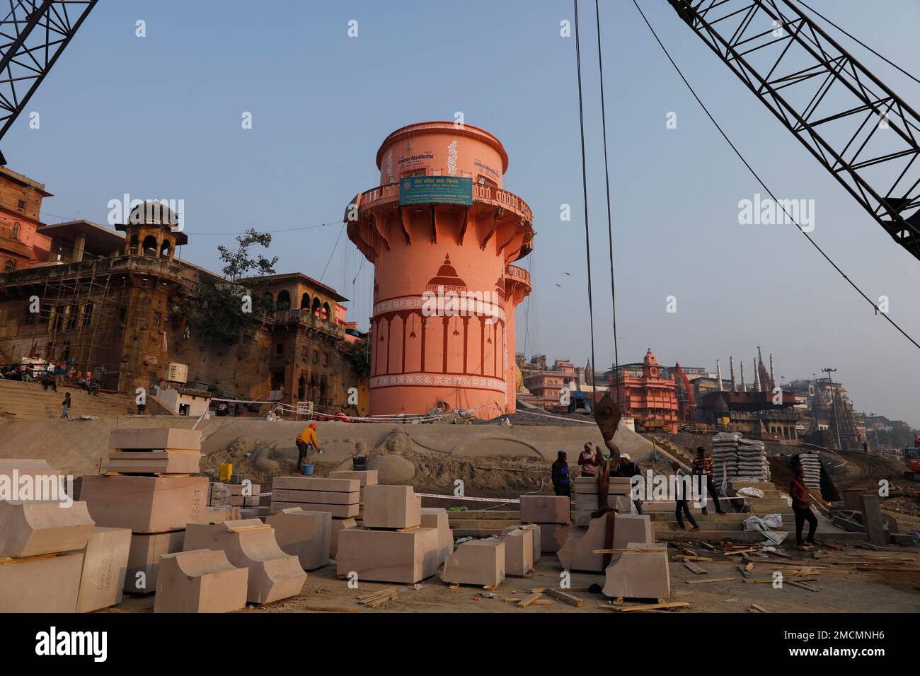 Laborers work at the under-construction Kashi Vishwanath Dham Corridor ...