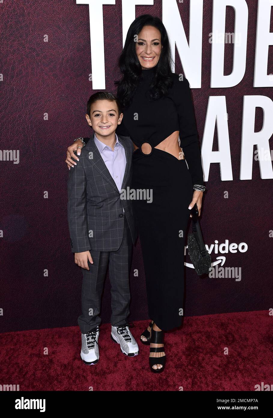 Daniel Ranieri poses with his mother at the premiere of "The Tender Bar ...