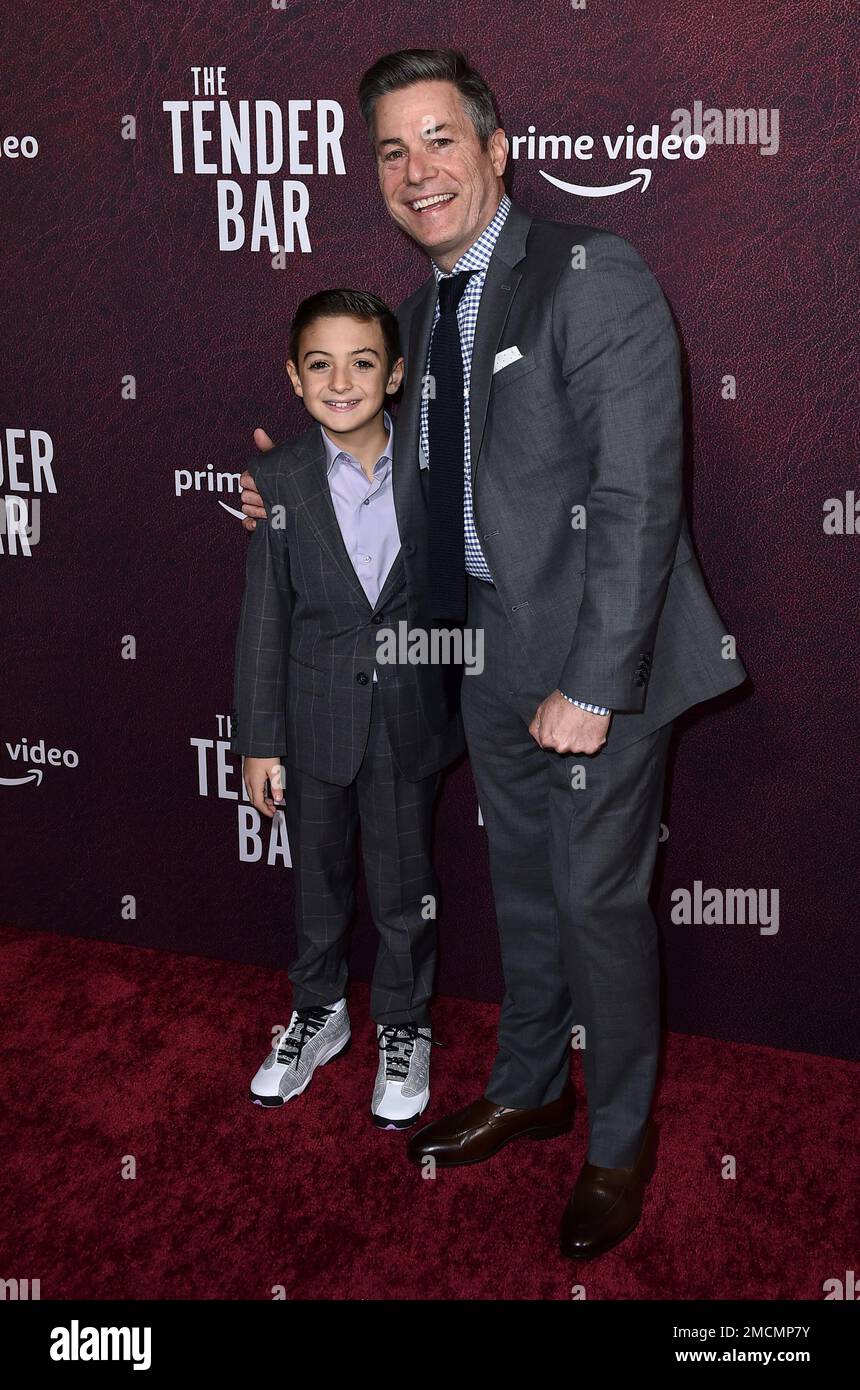 J.R. Moehringer, right, and Daniel Ranieri arrive at the premiere of ...