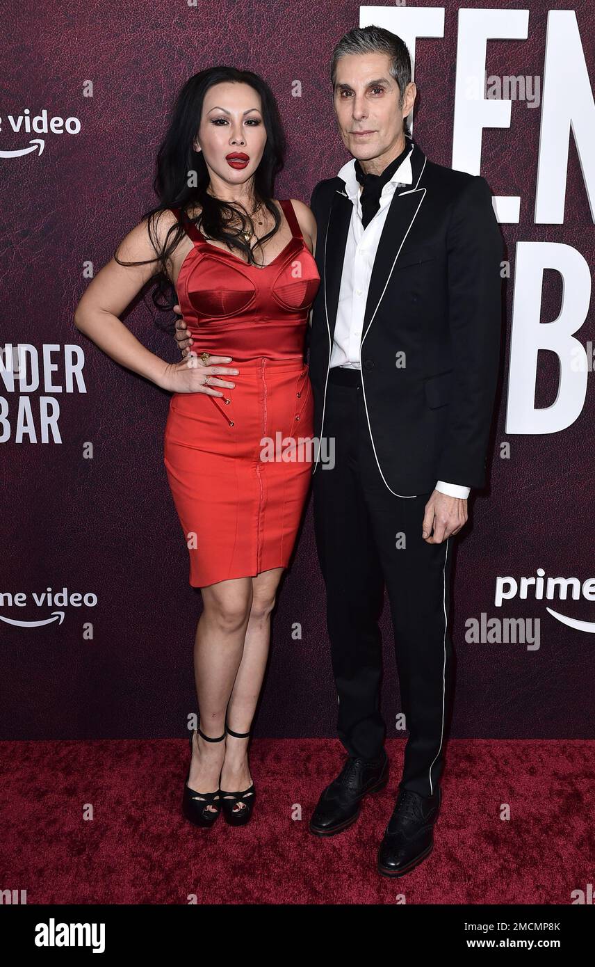 Etty Lau Farrell, left, and Perry Farrell arrive at the premiere of ...