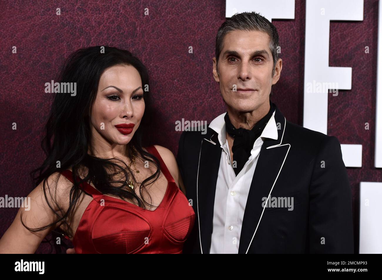 Etty Lau Farrell, left, and Perry Farrell arrive at the premiere of ...