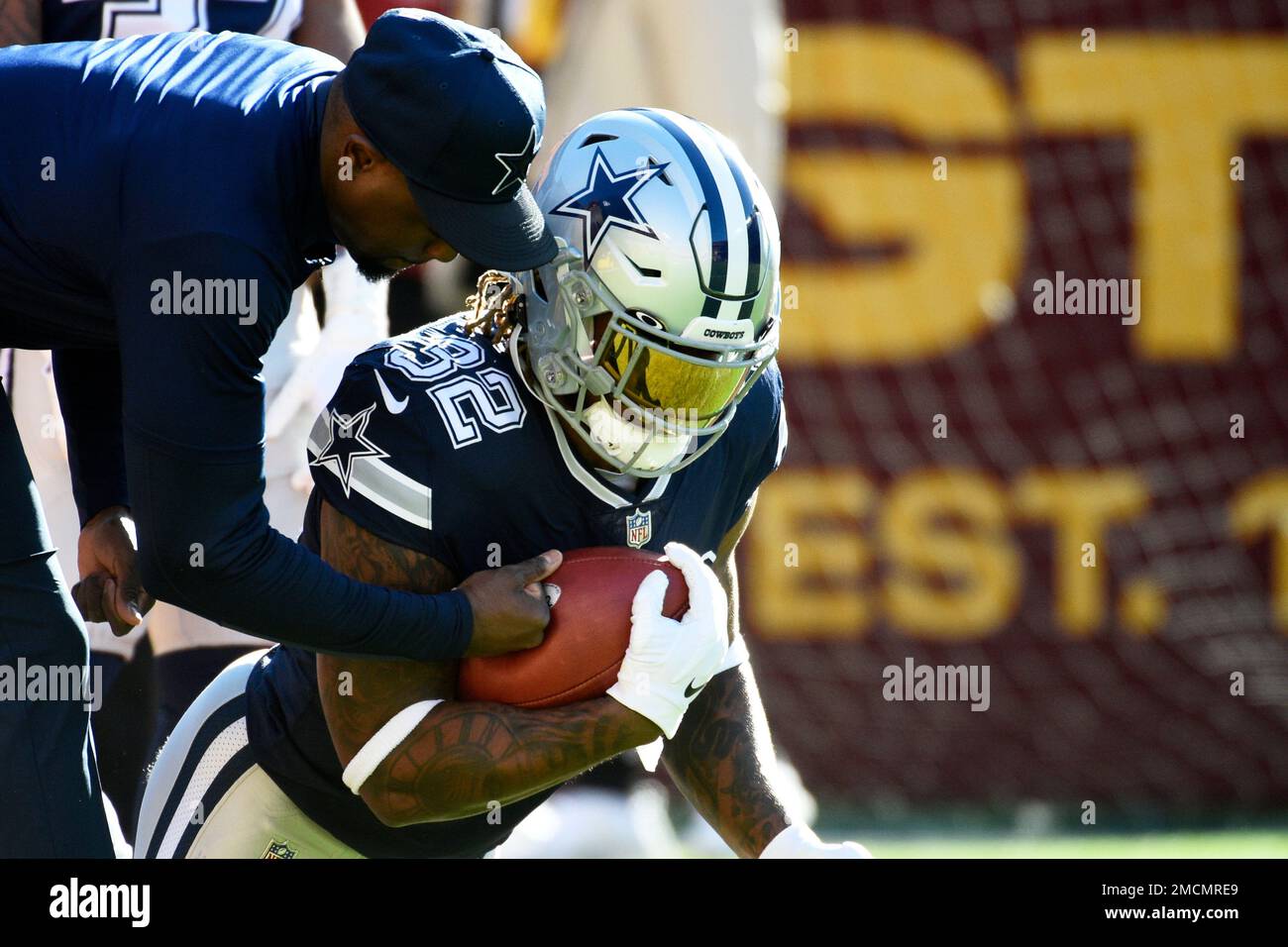 Dallas Cowboys running back Corey Clement warms up prior to an NFL ...