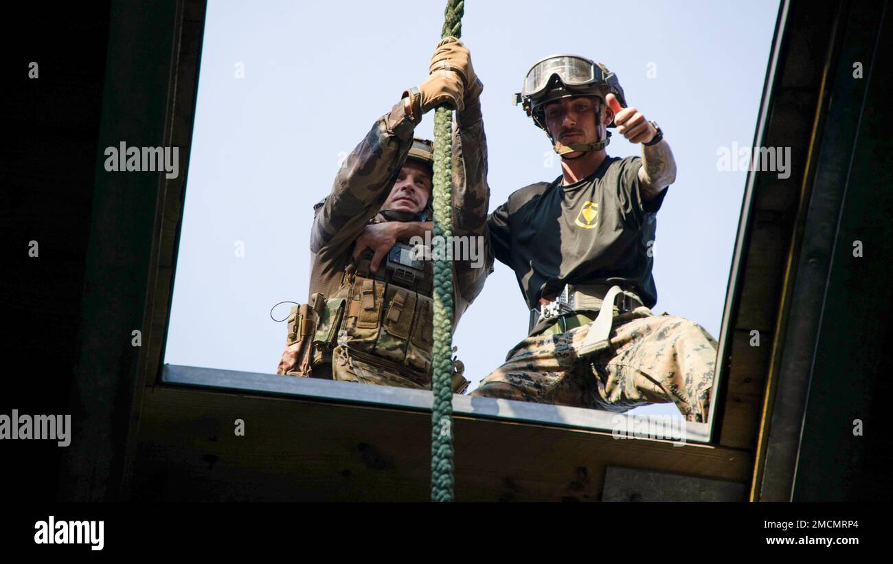 U.S. Marine Corps Sgt. Austun Stowers, a ropes instructor attached to ...