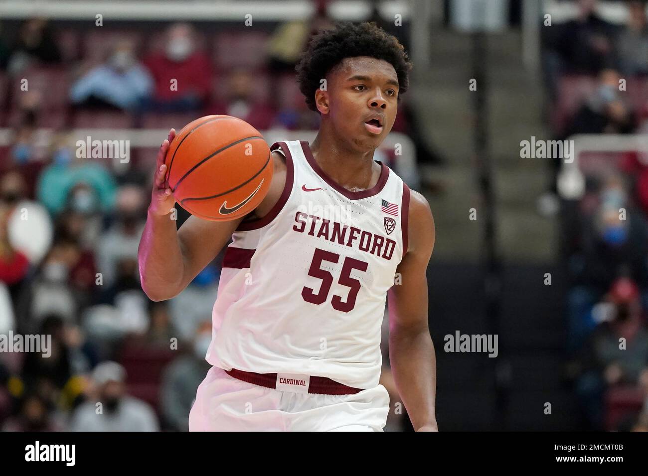 Stanford forward Harrison Ingram (55) dribbles up the court against ...