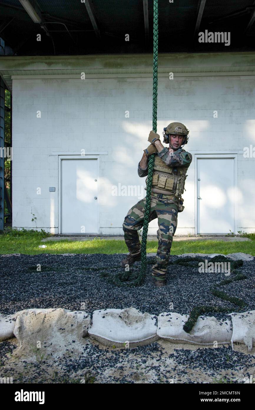 French Army Lieutenant Manouvrier successfully descends the fast rope ...