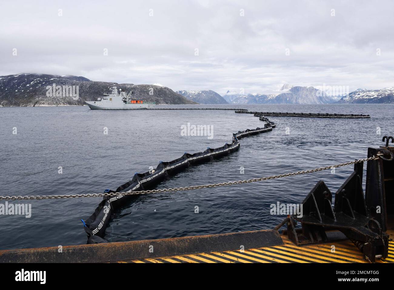 Boom is connected between USCGC Oak (WLM 211) and Danish navy ship ...