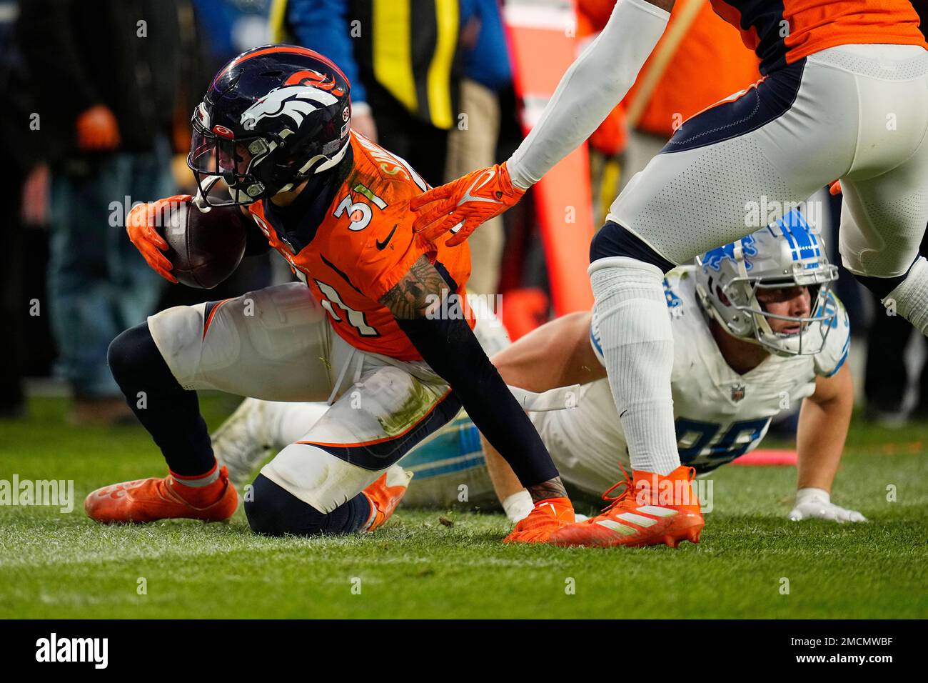 Denver Broncos free safety Justin Simmons (31) makes an interception ...