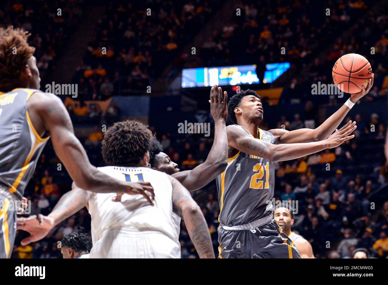 Kent State forward Justyn Hamilton (21) makes a layup against West ...
