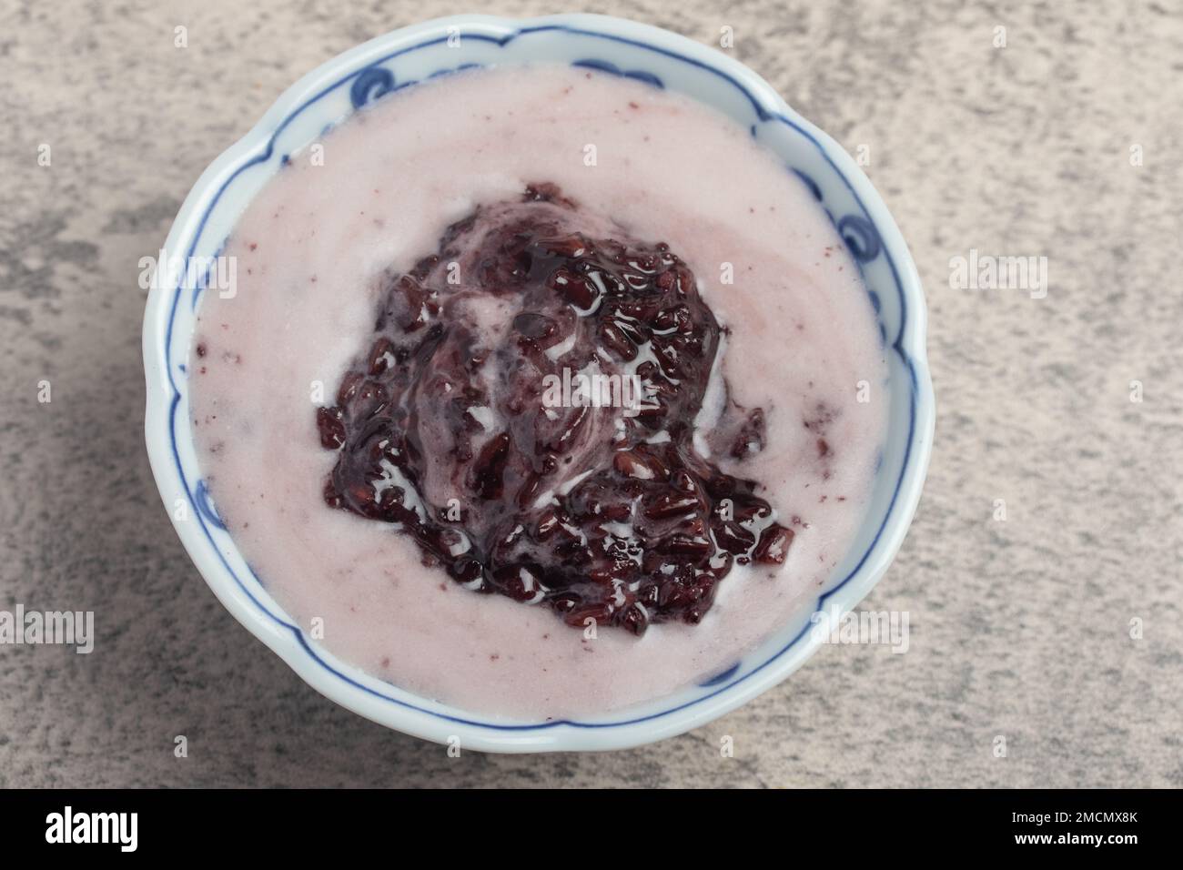 Black sticky rice in coconut milk Stock Photo - Alamy