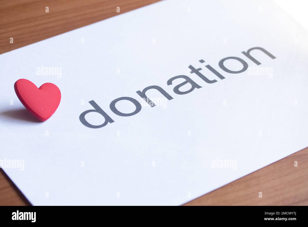 Red heart and donation. Heart donation concept Stock Photo - Alamy