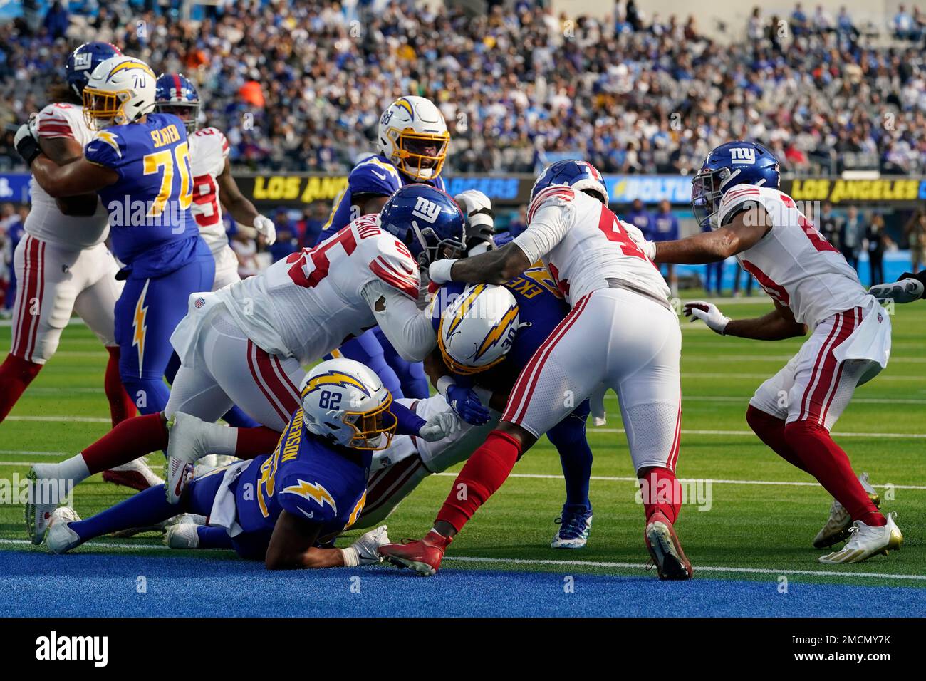 Los Angeles Chargers running back Austin Ekeler, center, scores during ...