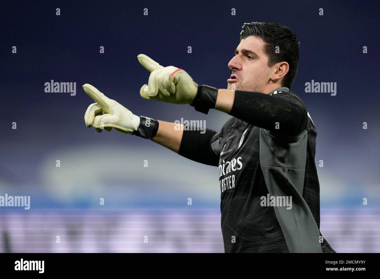 Real Madrid's goalkeeper Thibaut Courtois celebrates his side's second ...