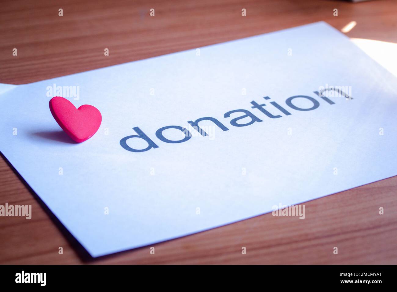 Red heart and donation. Heart donation concept Stock Photo - Alamy