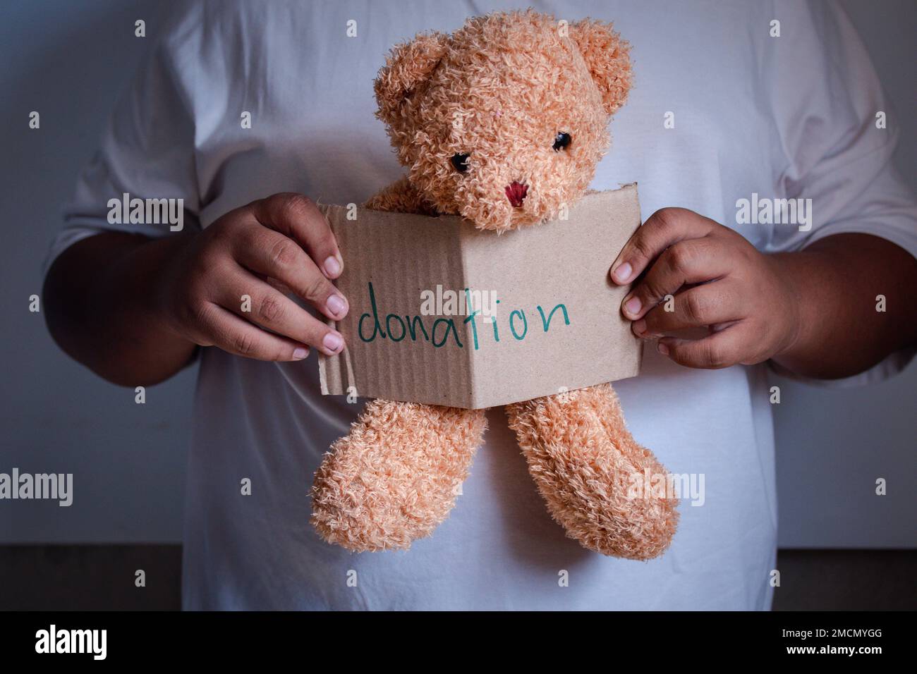 Teddy bear donation hi-res stock photography and images - Alamy